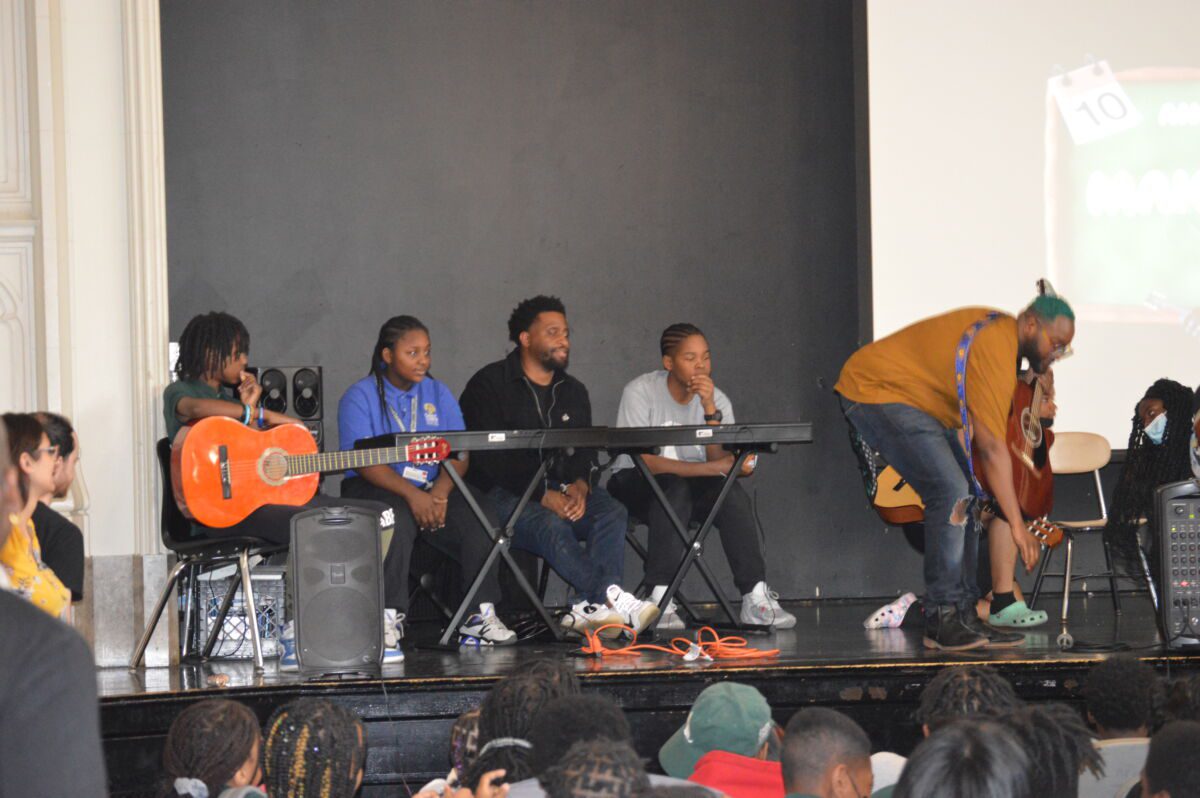 Guitars Over Guns Brings Music to Gary Comer Middle School - Noble Schools